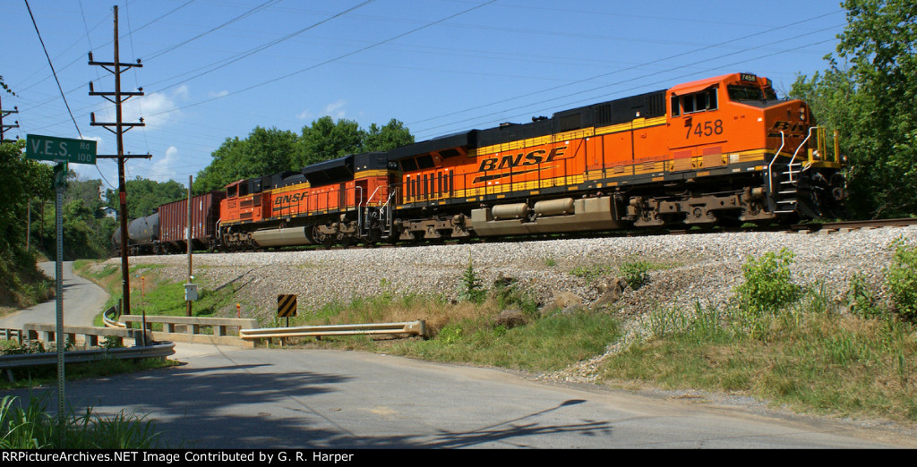 BNSF power on the K08015 at V.E.S. Rd. and Hydro Sts. 95 degrees today.